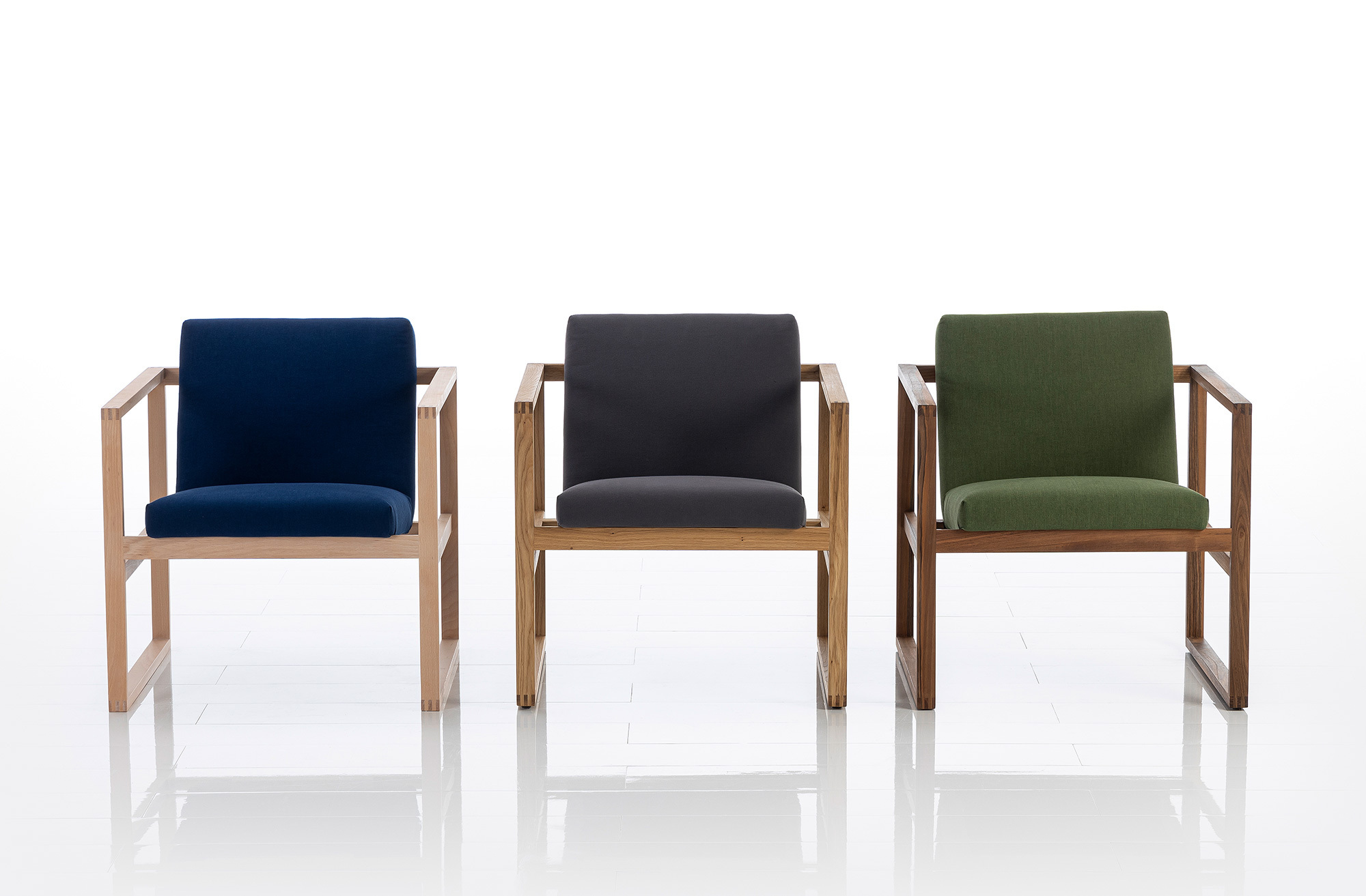 Grace wood low armchair by Brühl | STYLEPARK