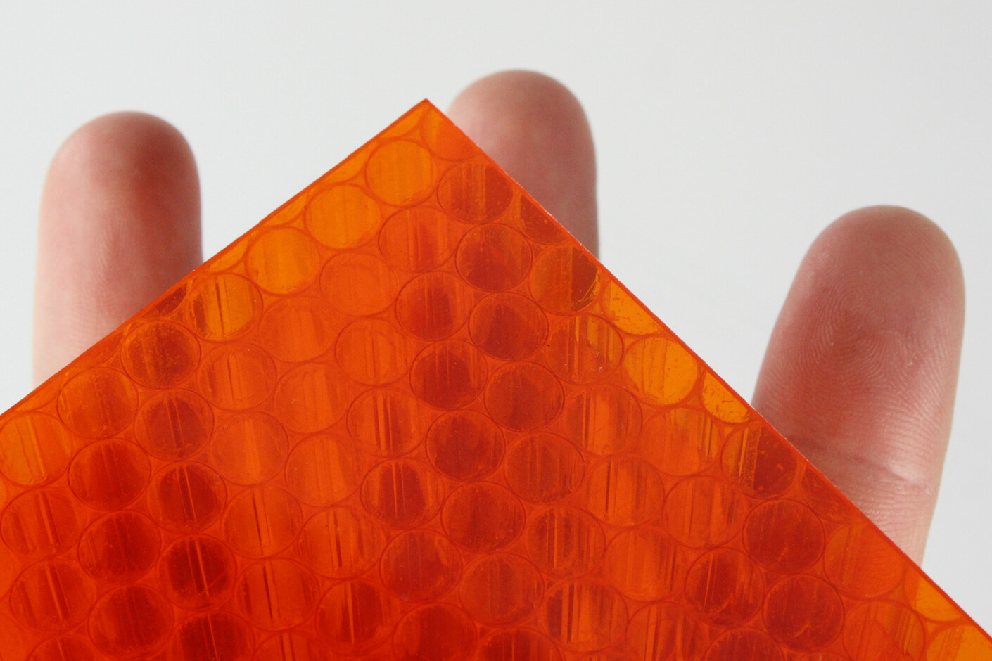 AIR-board® UV PC color orange by Design Composite | STYLEPARK