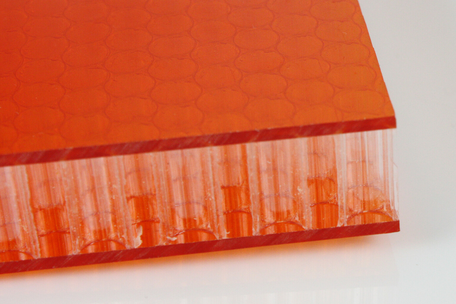 AIR-board® UV PC color orange by Design Composite | STYLEPARK