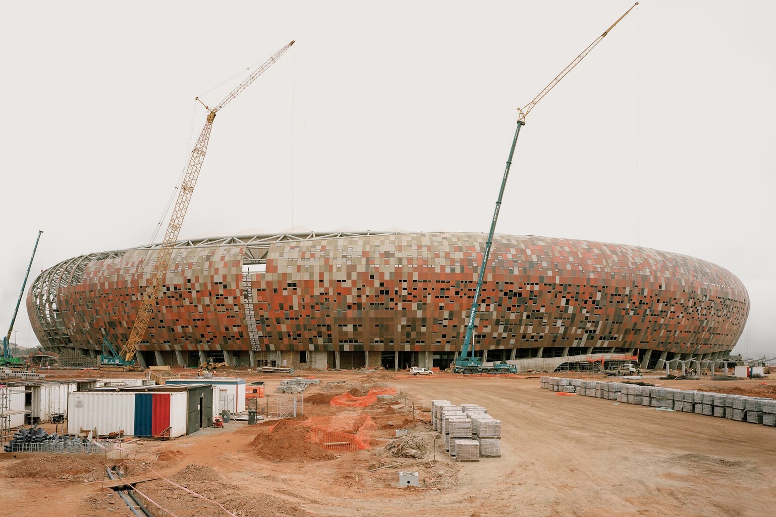 concrete skin, Soccer City Stadium, african colours by Rieder | STYLEPARK
